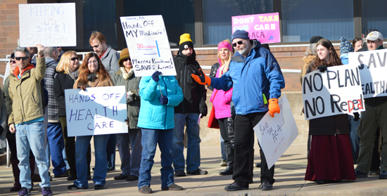 Crowd responds to threatened repeal of health care law | News, Sports ...